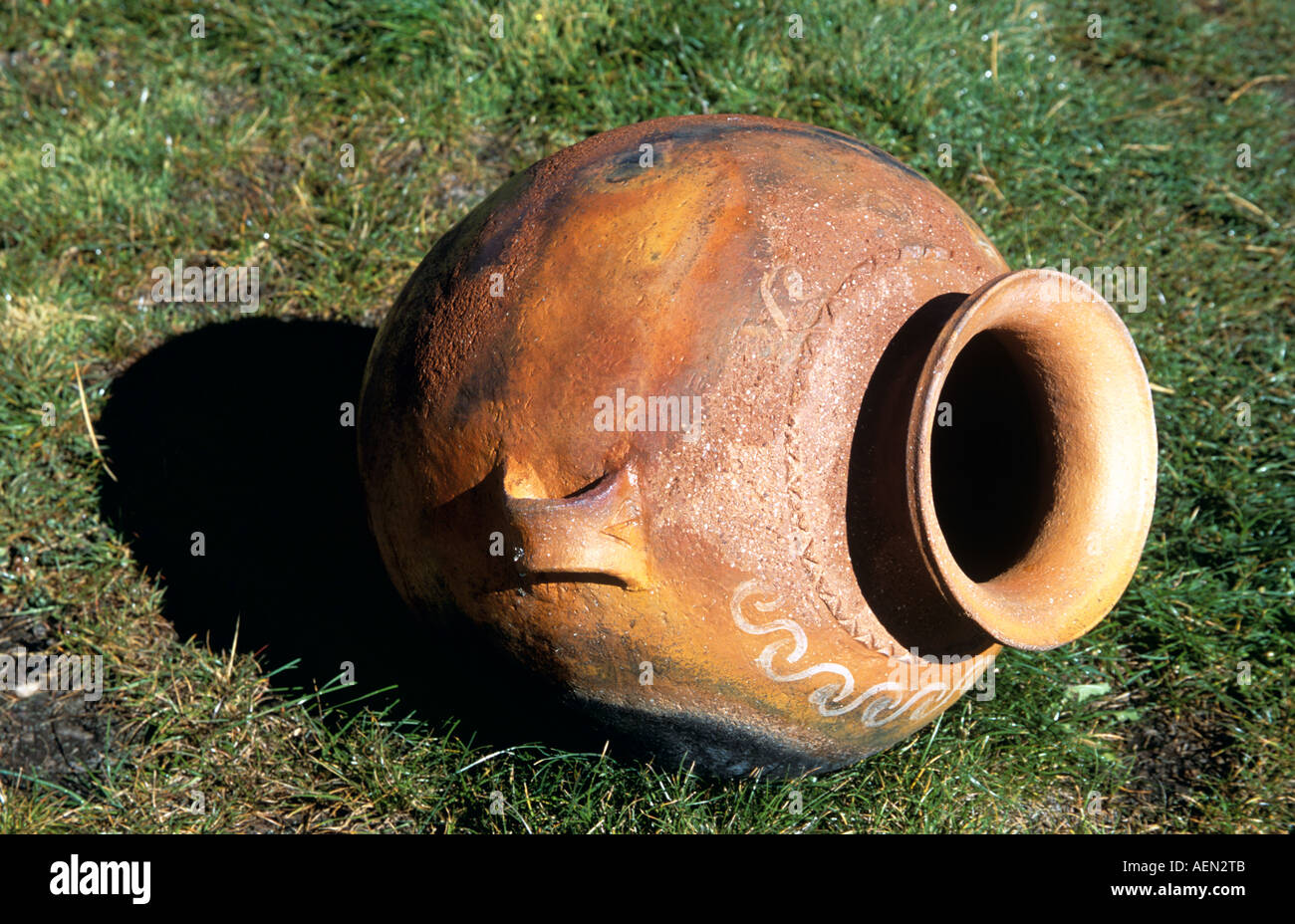 Pottery pot lying in the grass, Puno, Peru Stock Photo - Alamy