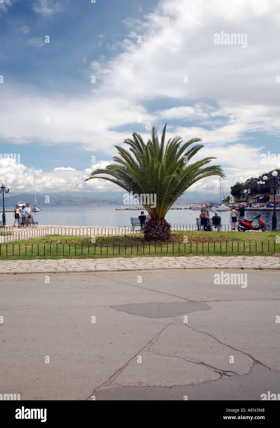 Seafront in Kassiopi harbour Stock Photo - Alamy