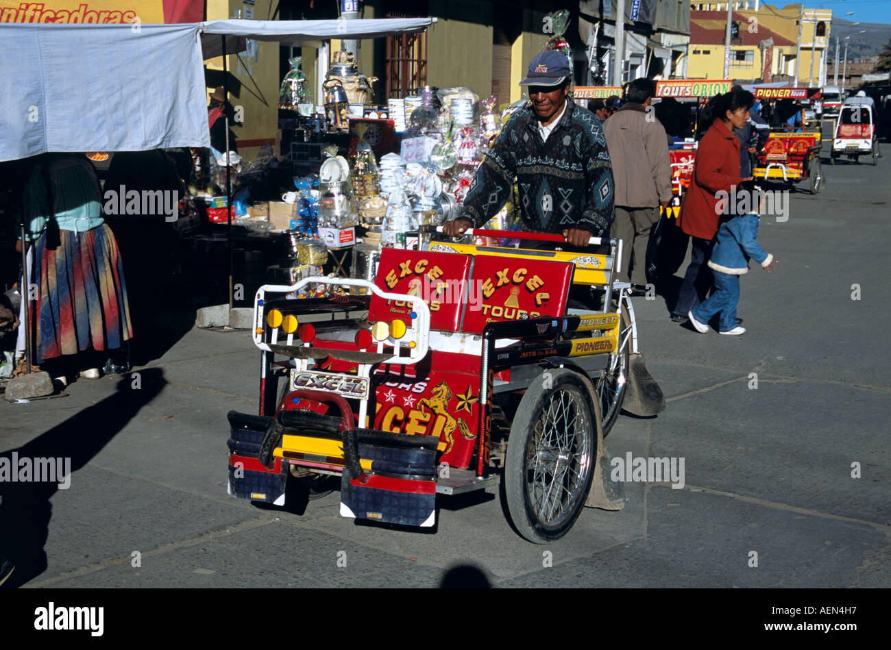 Man riding tricycle hi-res stock photography and images - Alamy