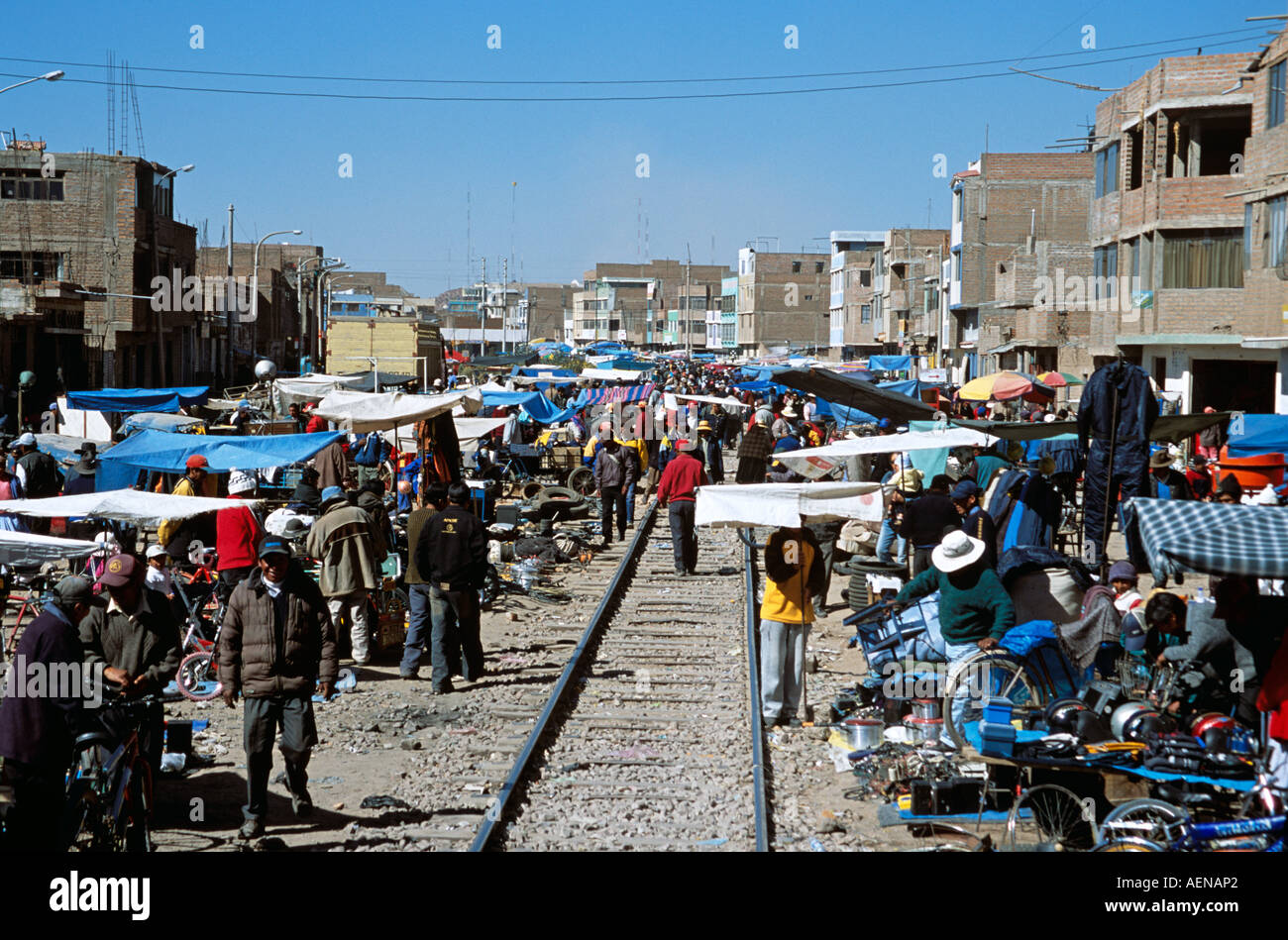 Passing through the town of Juliaca on Puno to Cusco Perurail train ...