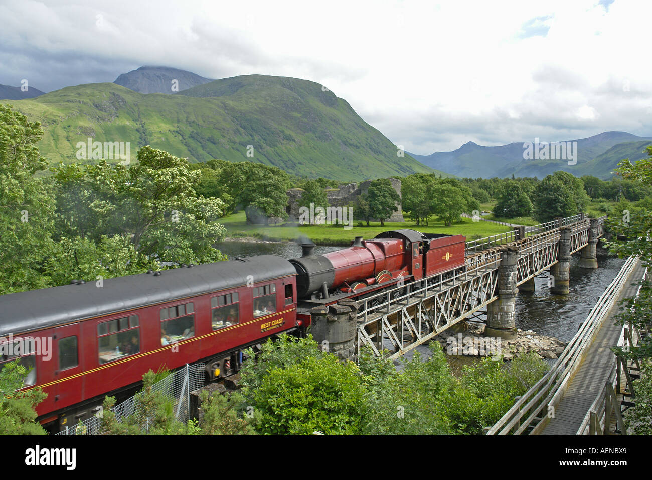 Former GWR Engine 5972 Olton Hall is shown crossing the river Lochy at ...
