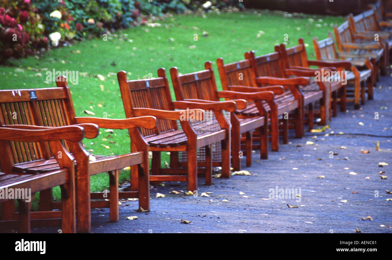 line of park benches Stock Photo - Alamy