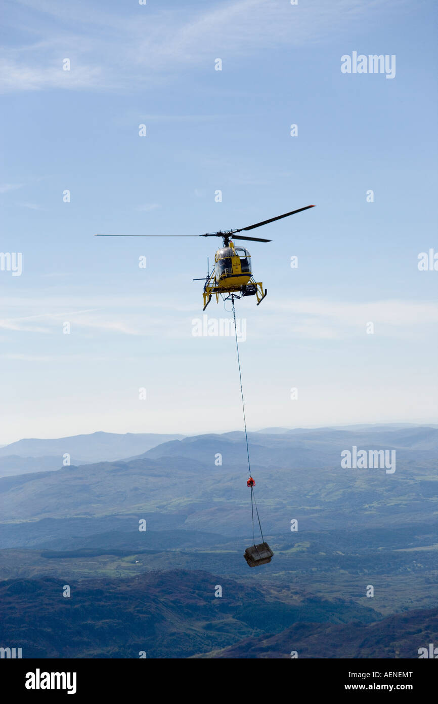 Helicopter flying material to build the new cafe on the top of Snowdon ...