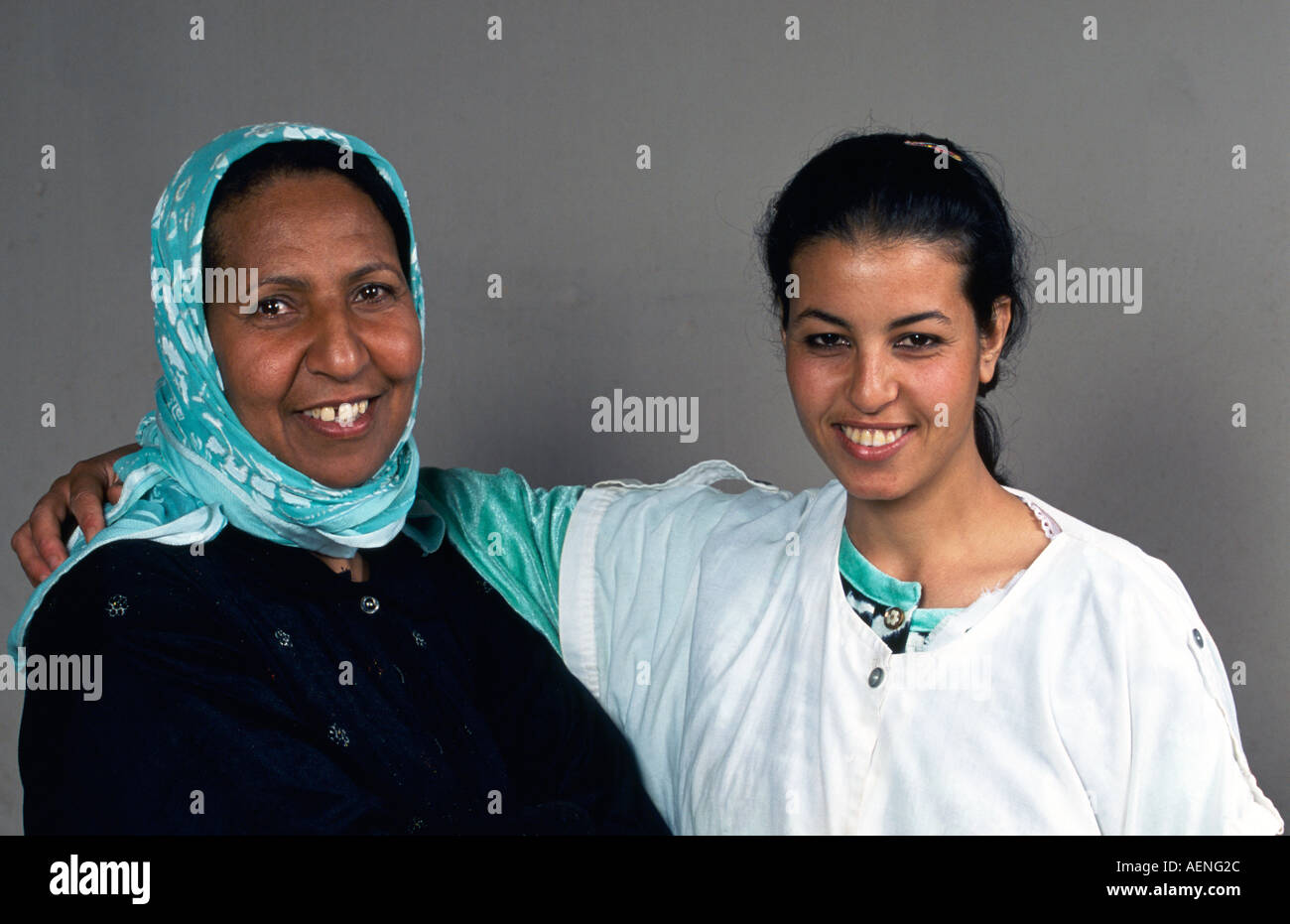woman with her daughter posing in the argan oil cooperative amal in the ...