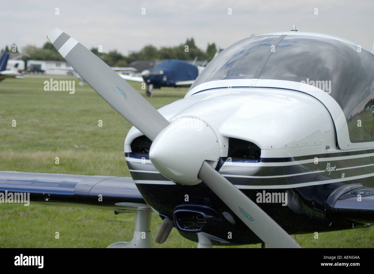 nose cone spinner of light aircraft parked on airfield Stock Photo - Alamy