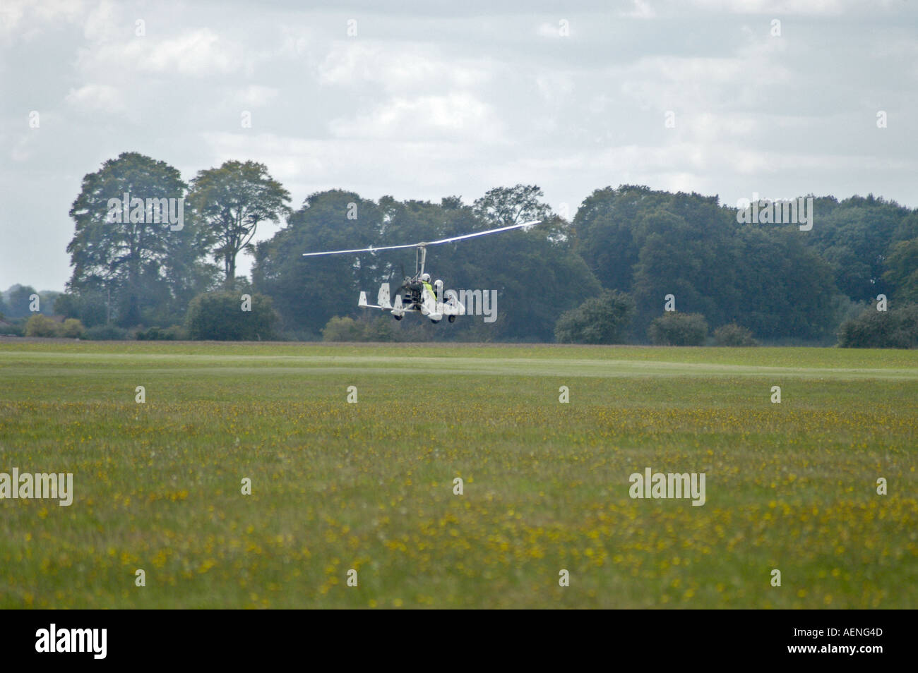 autogyro taking off or landing Stock Photo - Alamy