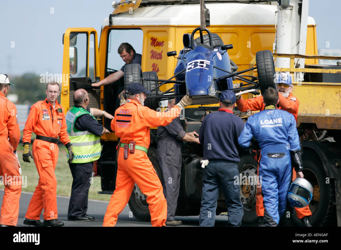 crashed blue Van Diemen RF92 Formula Ford FF 1600 loaded onto recovery ...