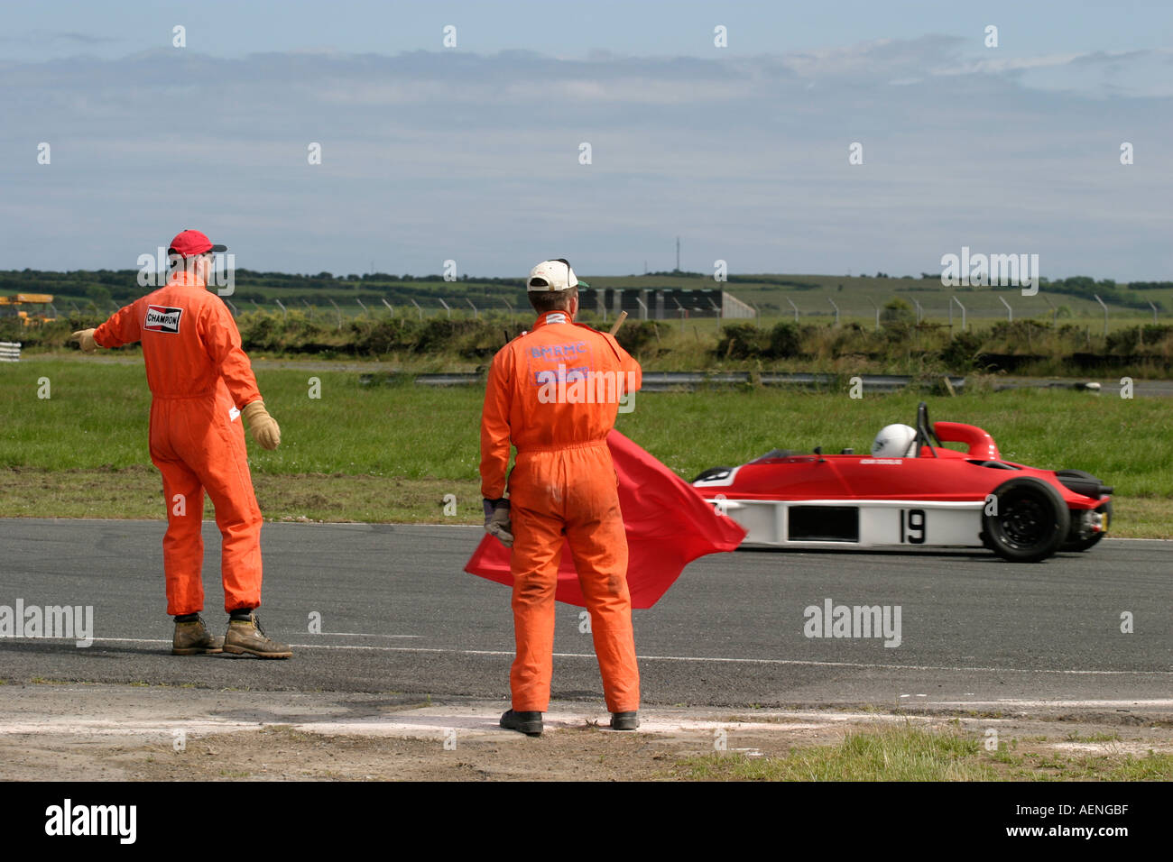 Marshalls wave red flag to signify end of FF 1600 formula ford race at ...
