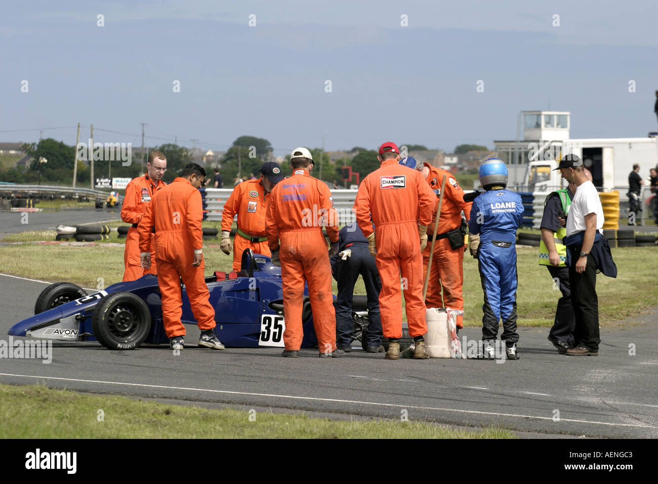 crashed blue Van Diemen RF92 Formula Ford FF 1600 with marshalls and ...