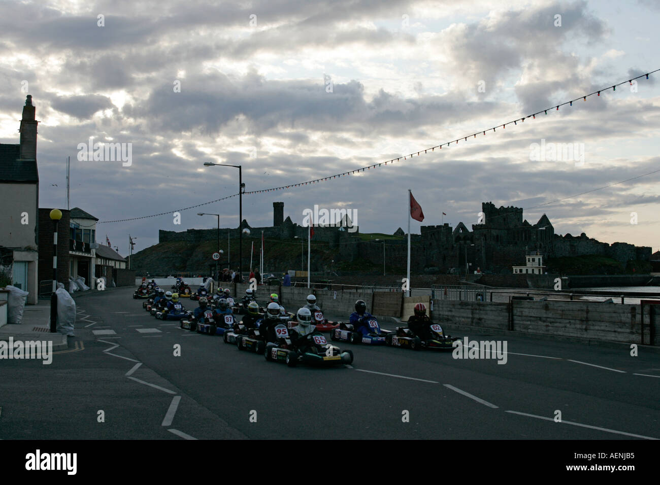 Drivers race in shadow of Peel Castle at Peel Kart Grand Prix IOM isle ...