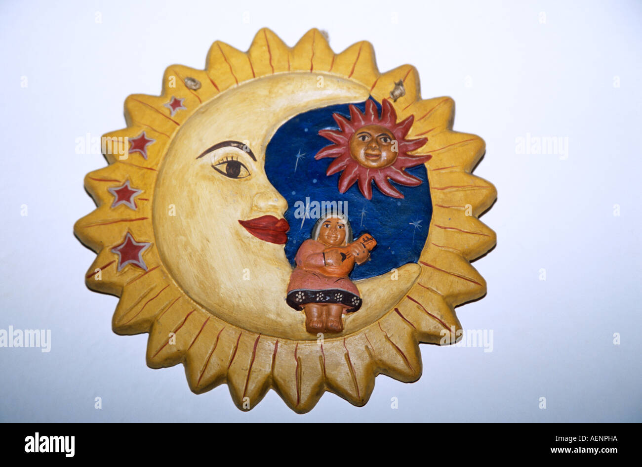 Wall plaque depicting the sun and moon, hanging on a wall, Peru Stock ...