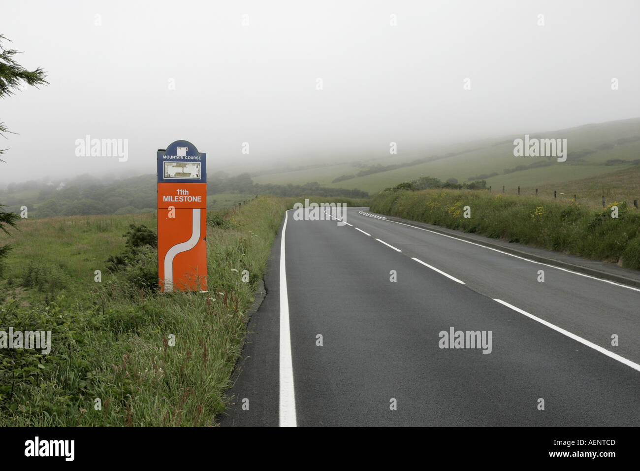 11th milestone on the isle of man TT course IOM Stock Photo - Alamy