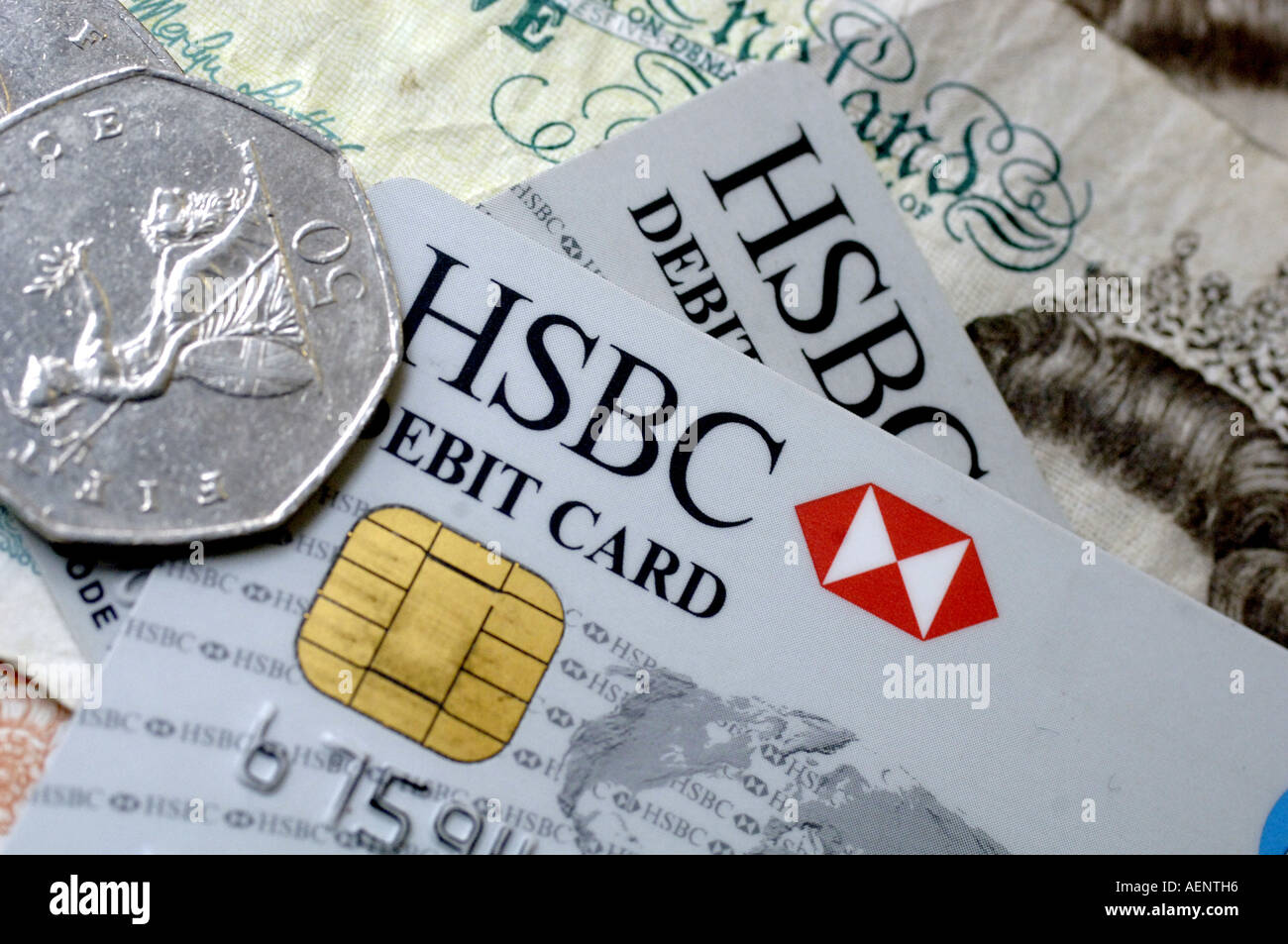 Pound notes and coins credit card hi-res stock photography and images ...