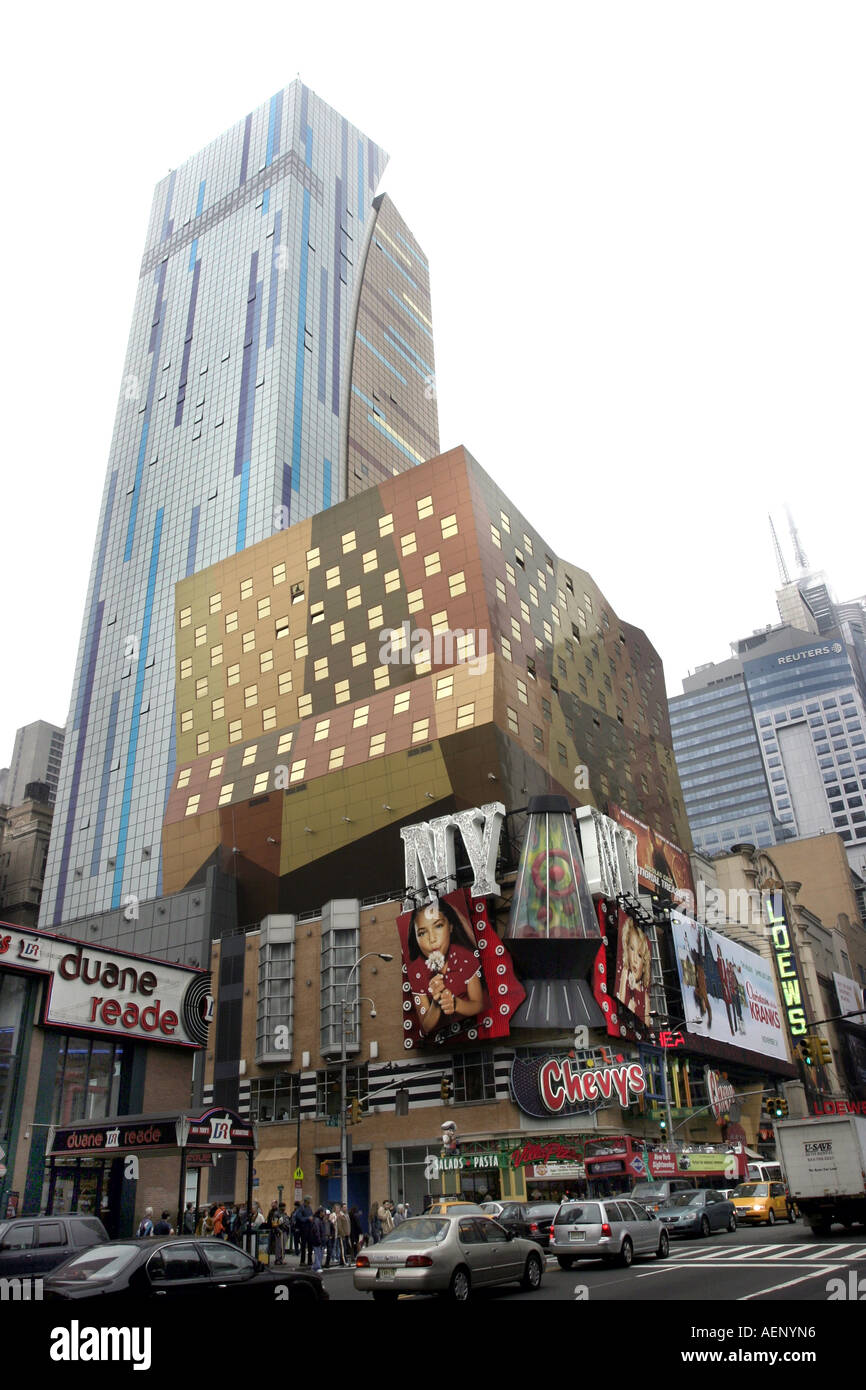 Tall angular and colourful buildings with signs Manhattan New York ...