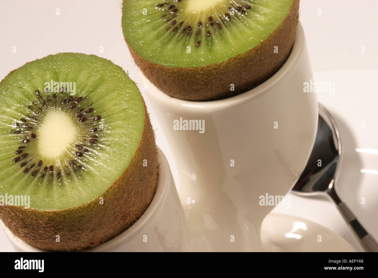 Kiwi Fruit in a Double Egg Cup Stock Photo - Alamy