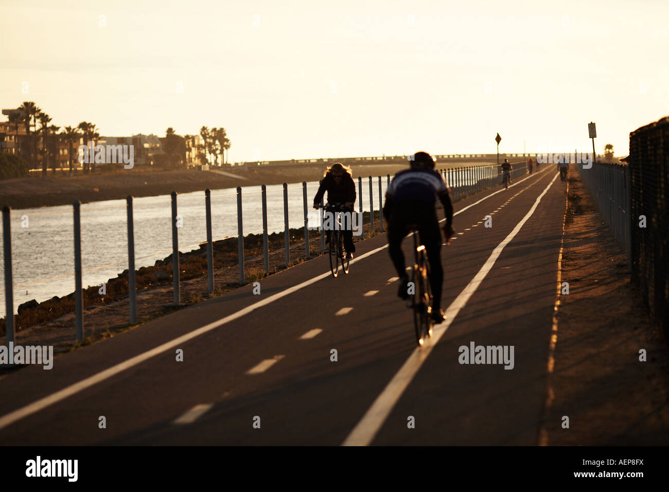 Bikers Riding at Sunset on the Strand Bike Path Marina del Rey ...
