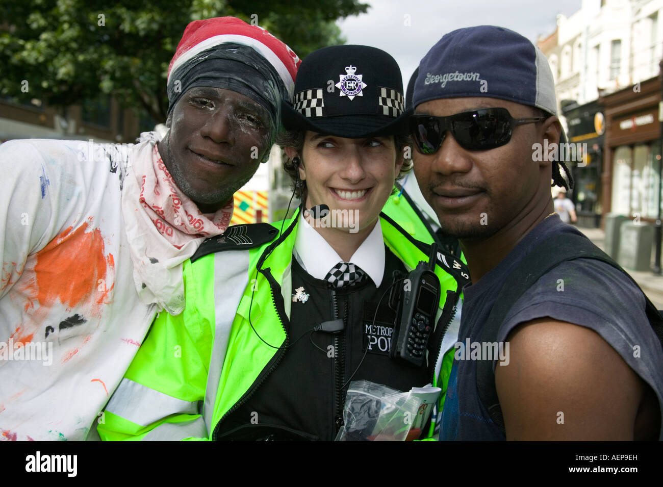 Notting Hill Carnival - Two black men with female police officer Stock ...