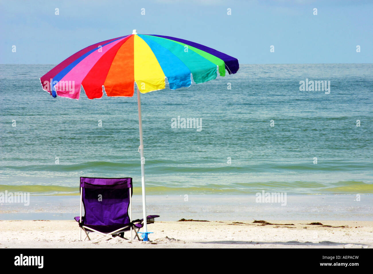 Beach chair and umbrella on Florida Gulf Coast Stock Photo - Alamy