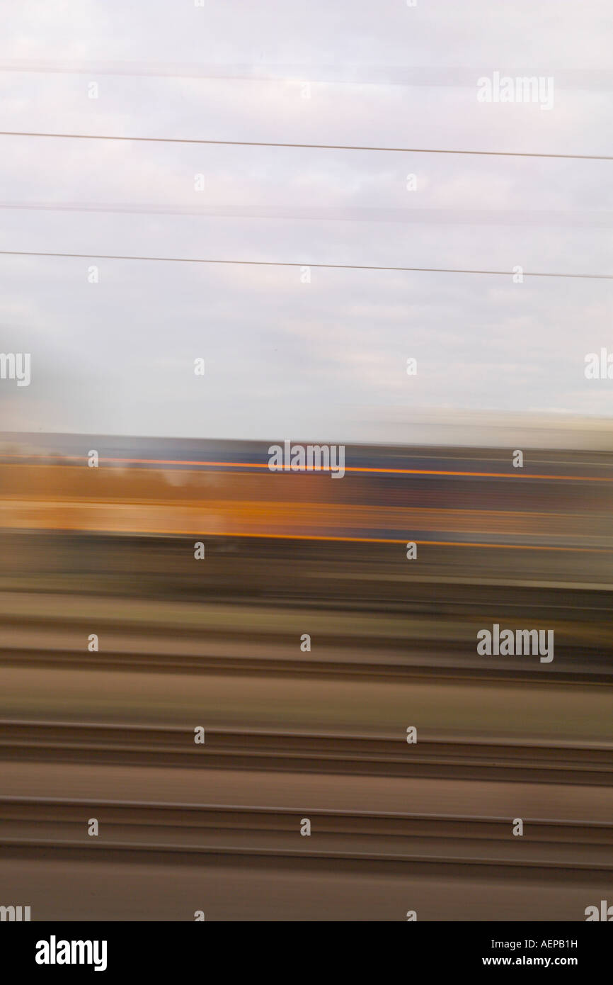 fast yellow train & tracks Stock Photo - Alamy