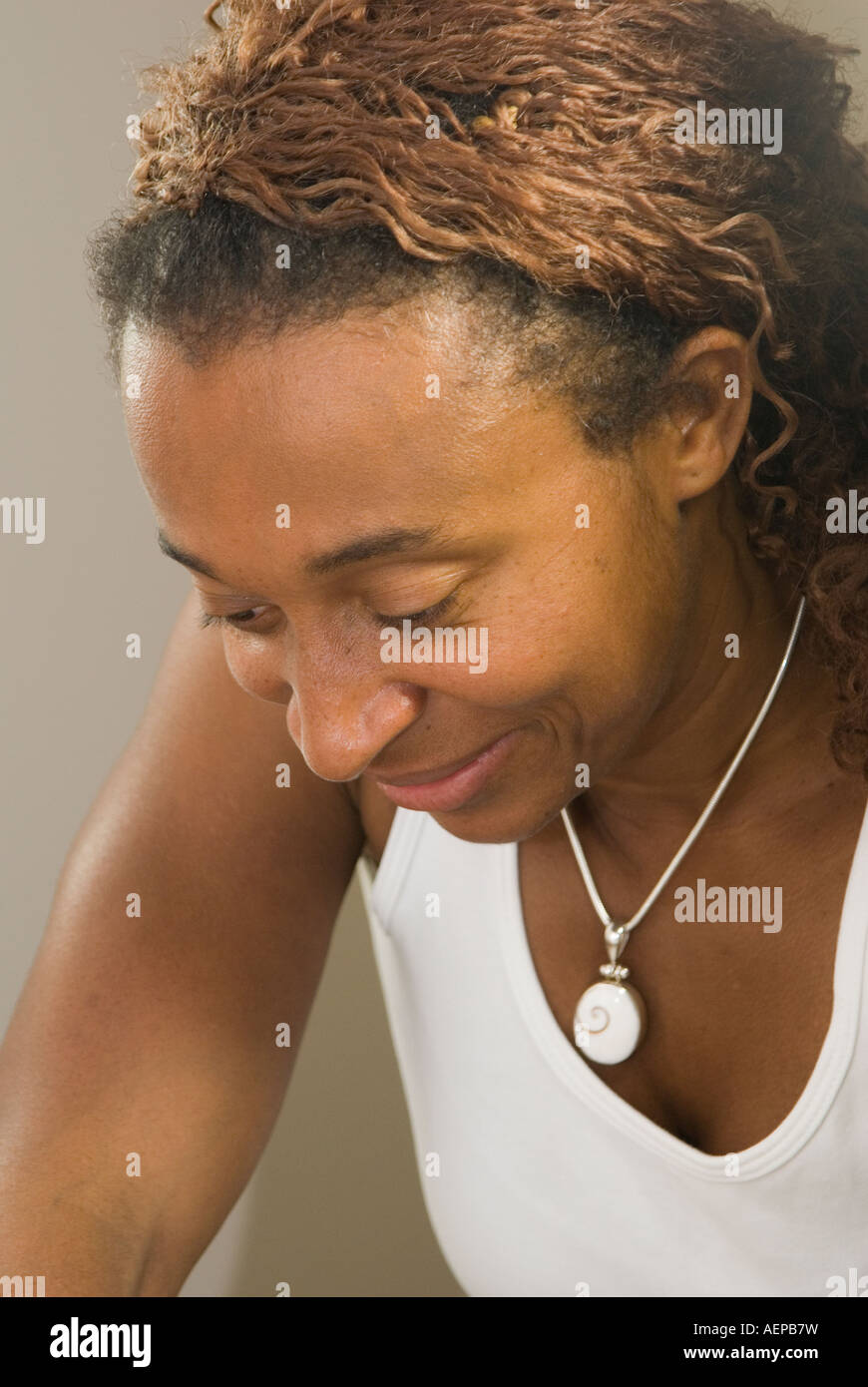 Woman close up looking down hi-res stock photography and images - Alamy