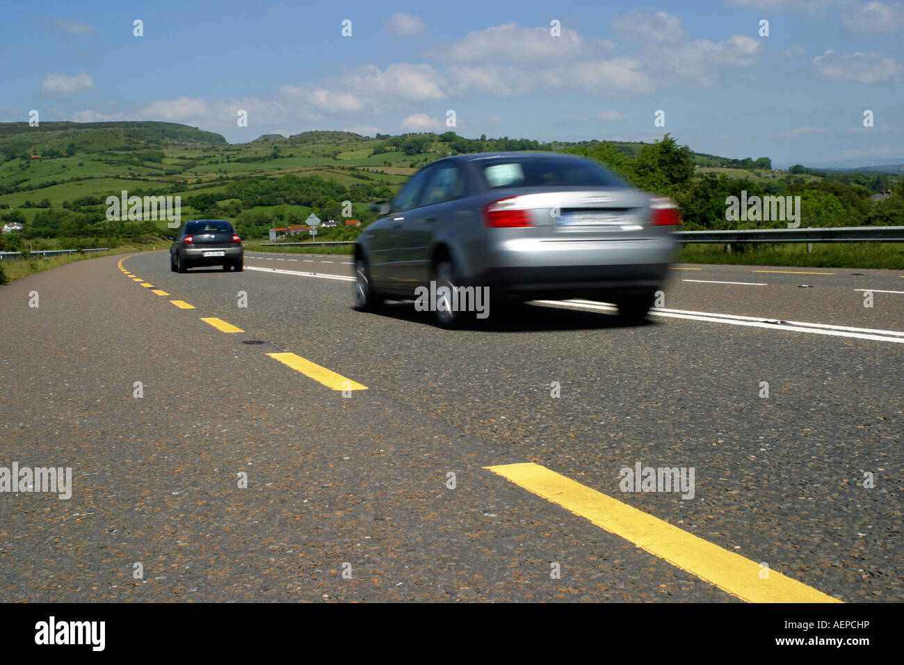 Speeding car on an Irish Road Stock Photo - Alamy