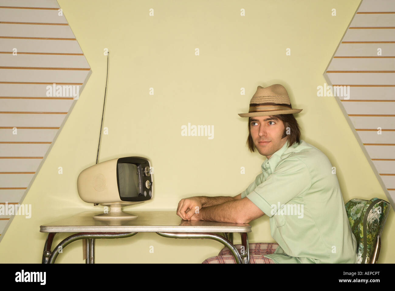 Man sitting in front of his tv set hi-res stock photography and images ...