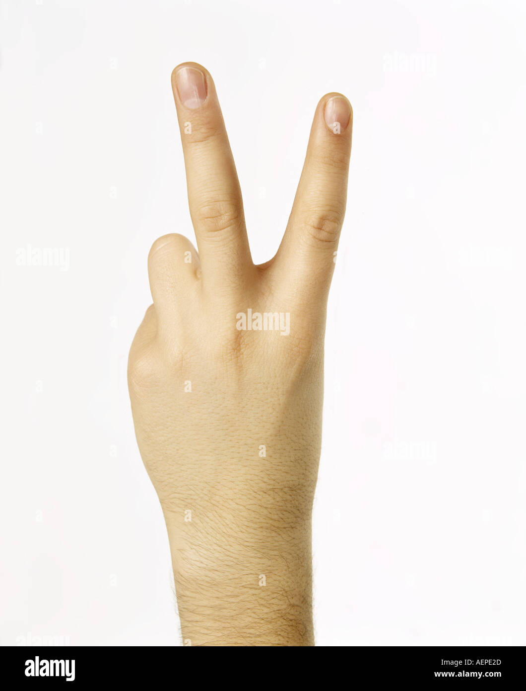 Male hand making a V sign Stock Photo - Alamy
