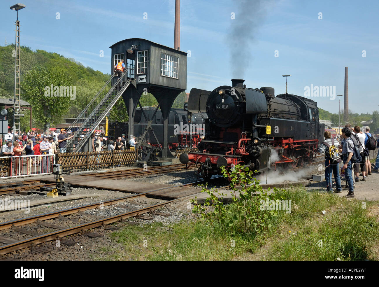 German steam engine accelerating past Bochum railway museum during 30th ...