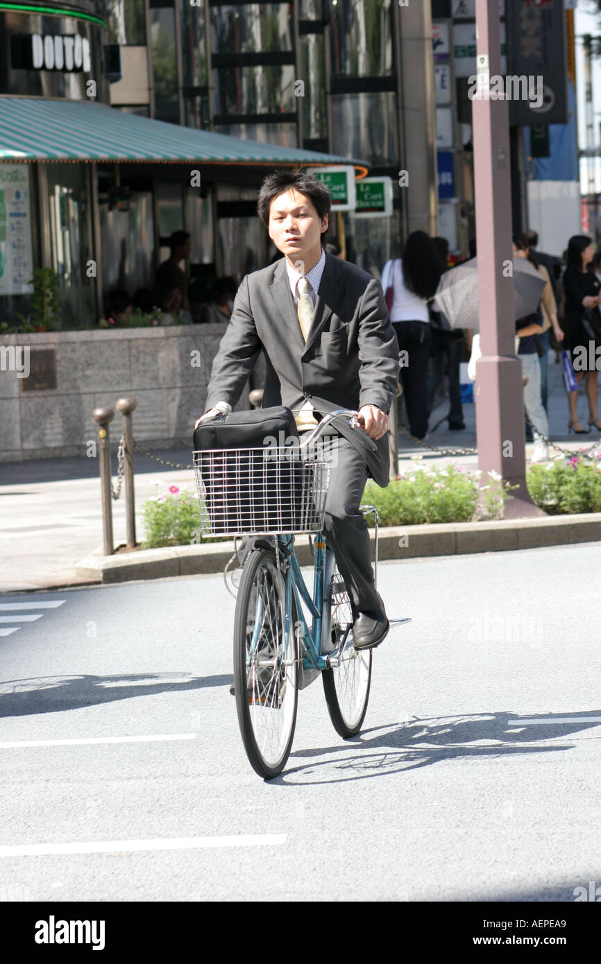 Man on Bicycle Ginza Street Tokyo Japan Stock Photo - Alamy