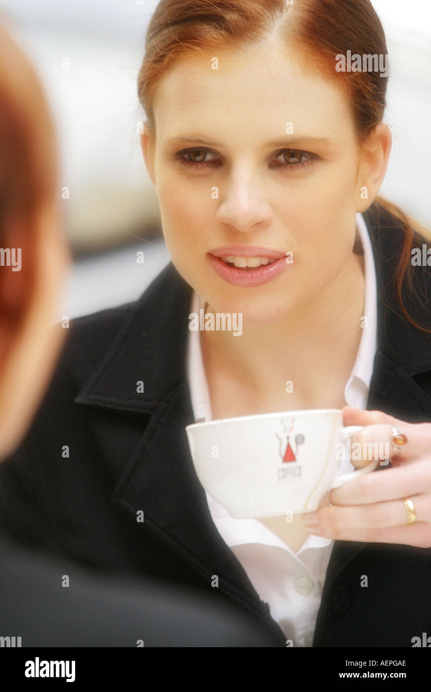 women having coffee Stock Photo - Alamy