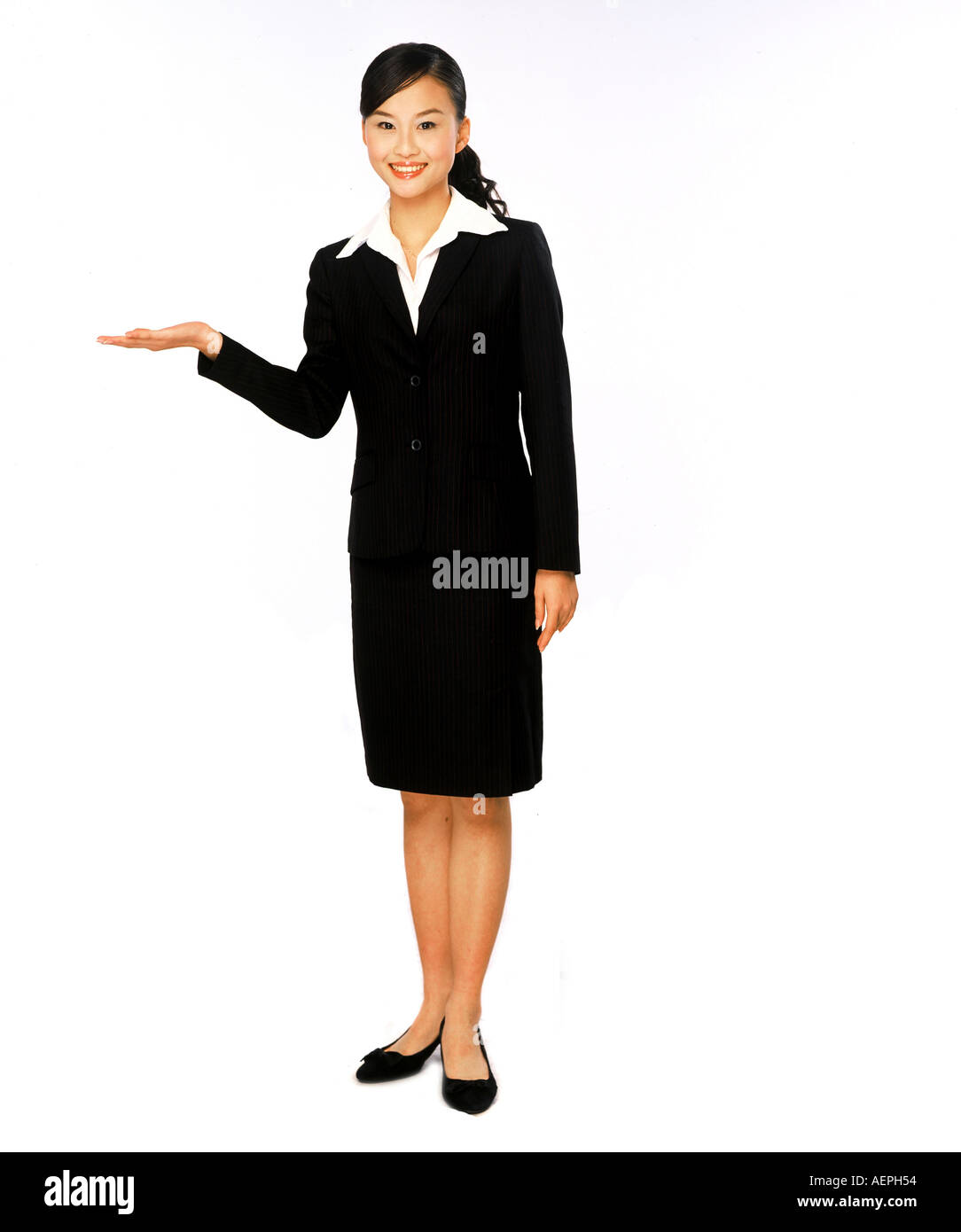 Asian female hostess Cut Out Stock Images & Pictures - Alamy
