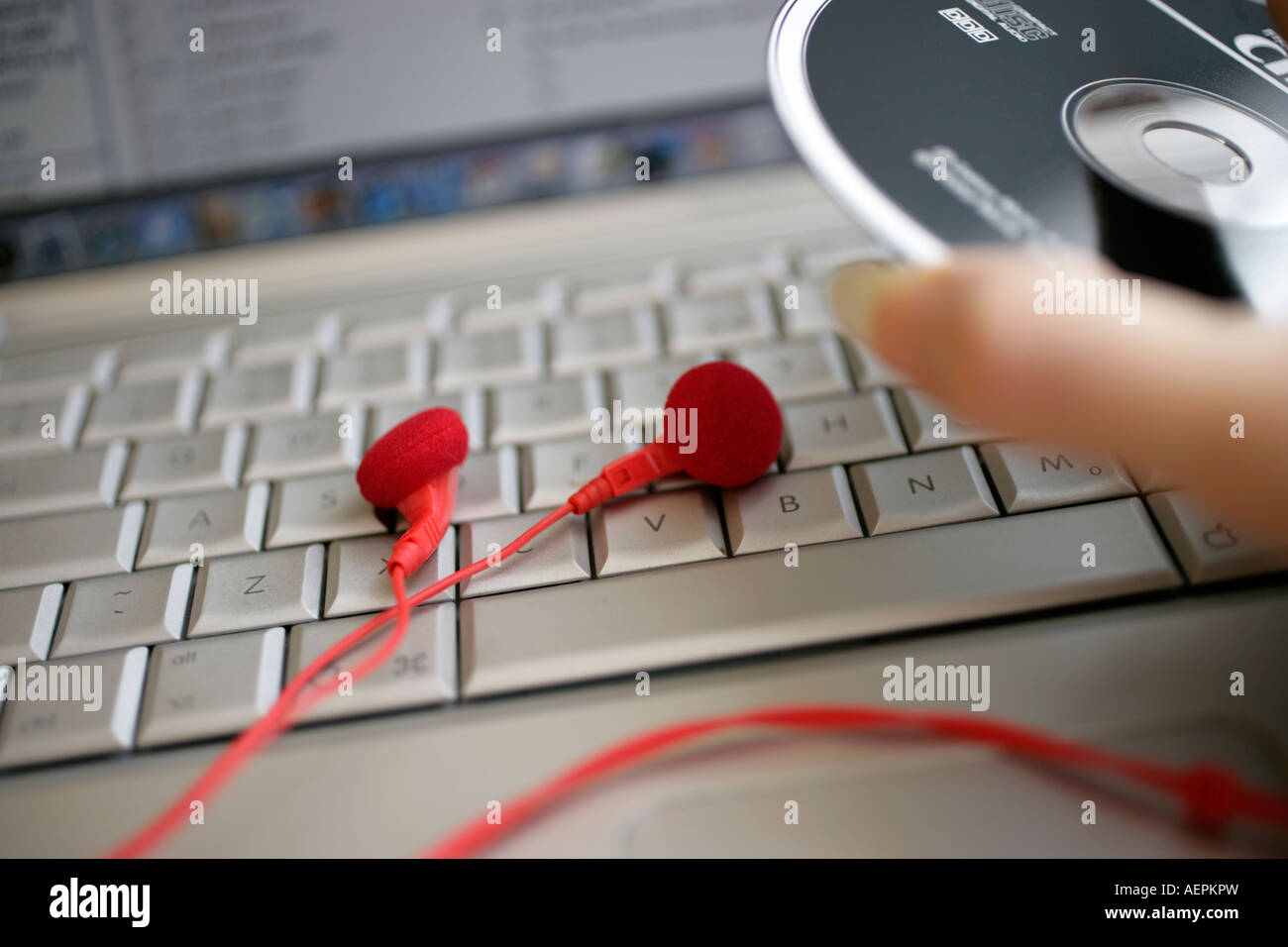 Laptop computer earplug hi-res stock photography and images - Alamy