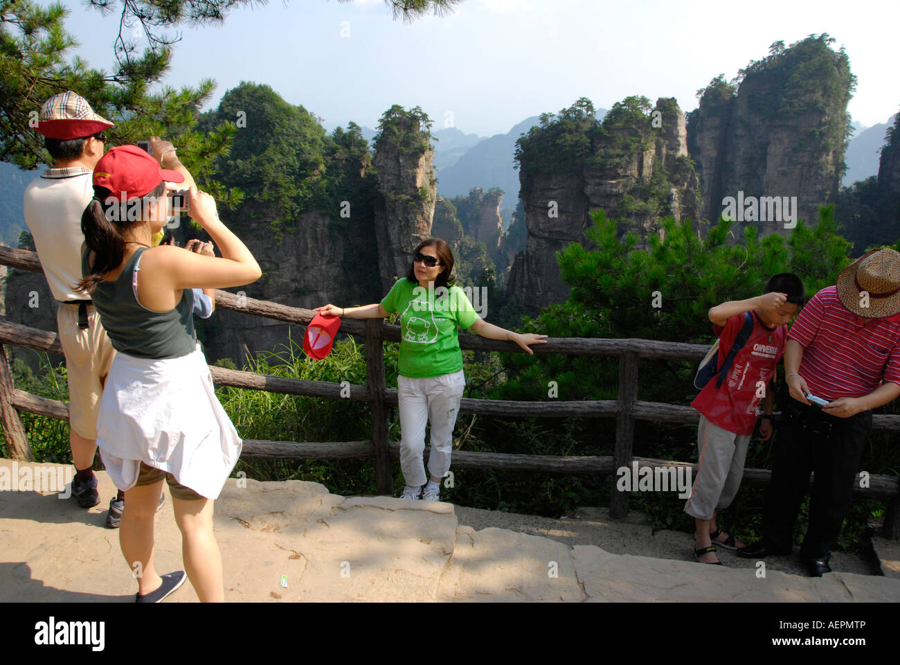 tourists enjoying Limestone Rock formation out crop at first chinese ...