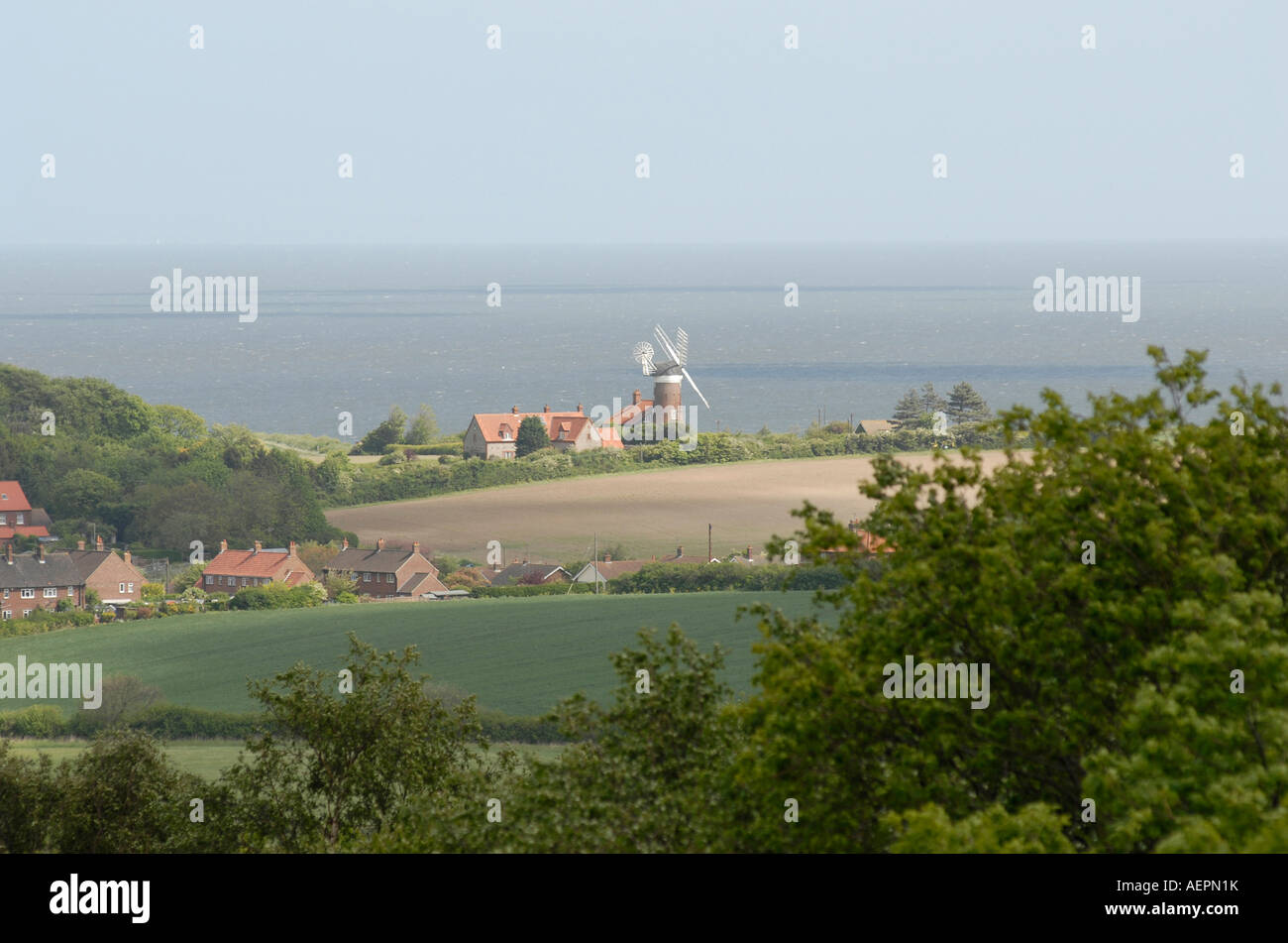 Weybourne village and windmill set in the North Norfolk landscape Stock ...