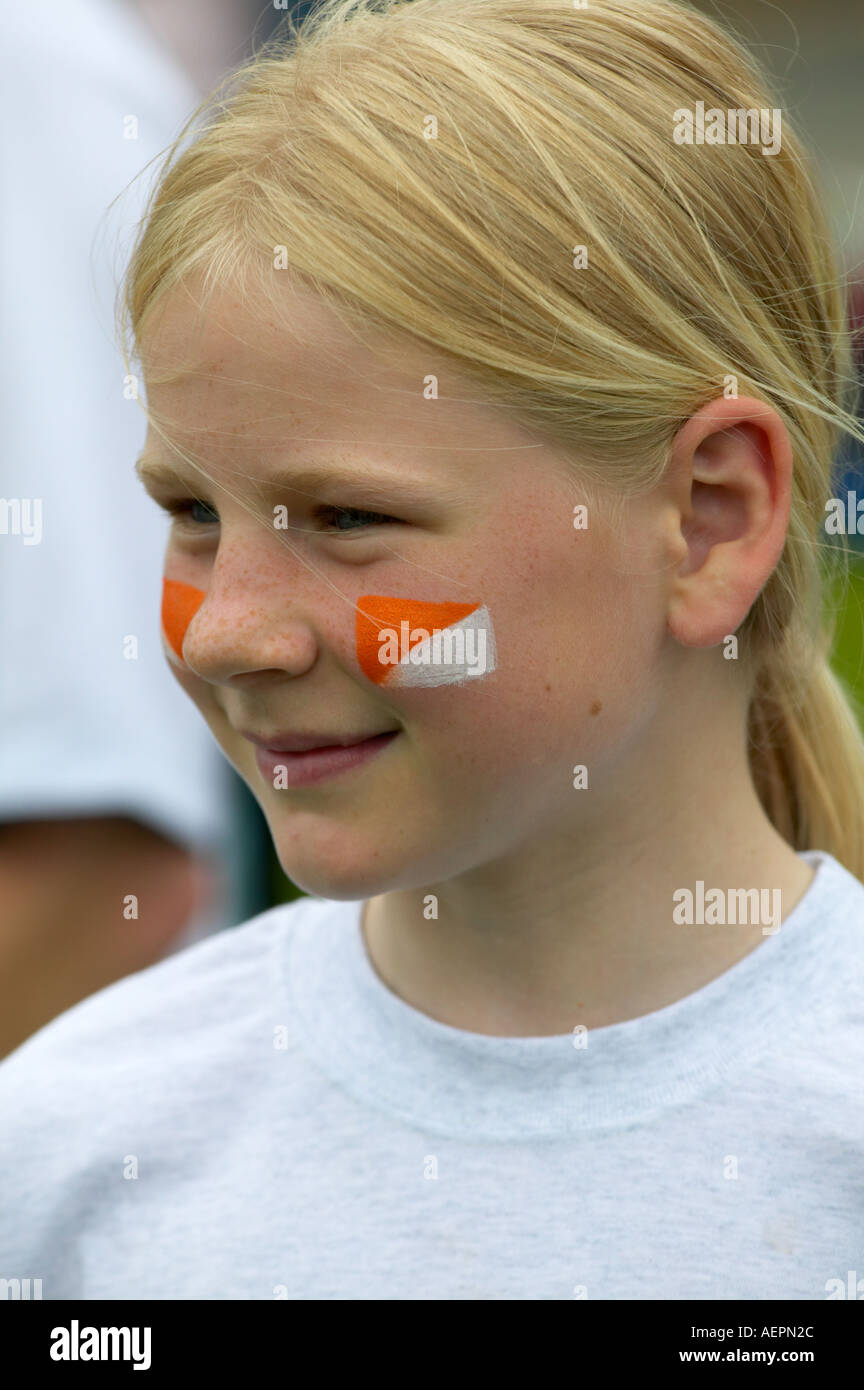 young girl with face painted with map symbols orienteering Stock Photo ...
