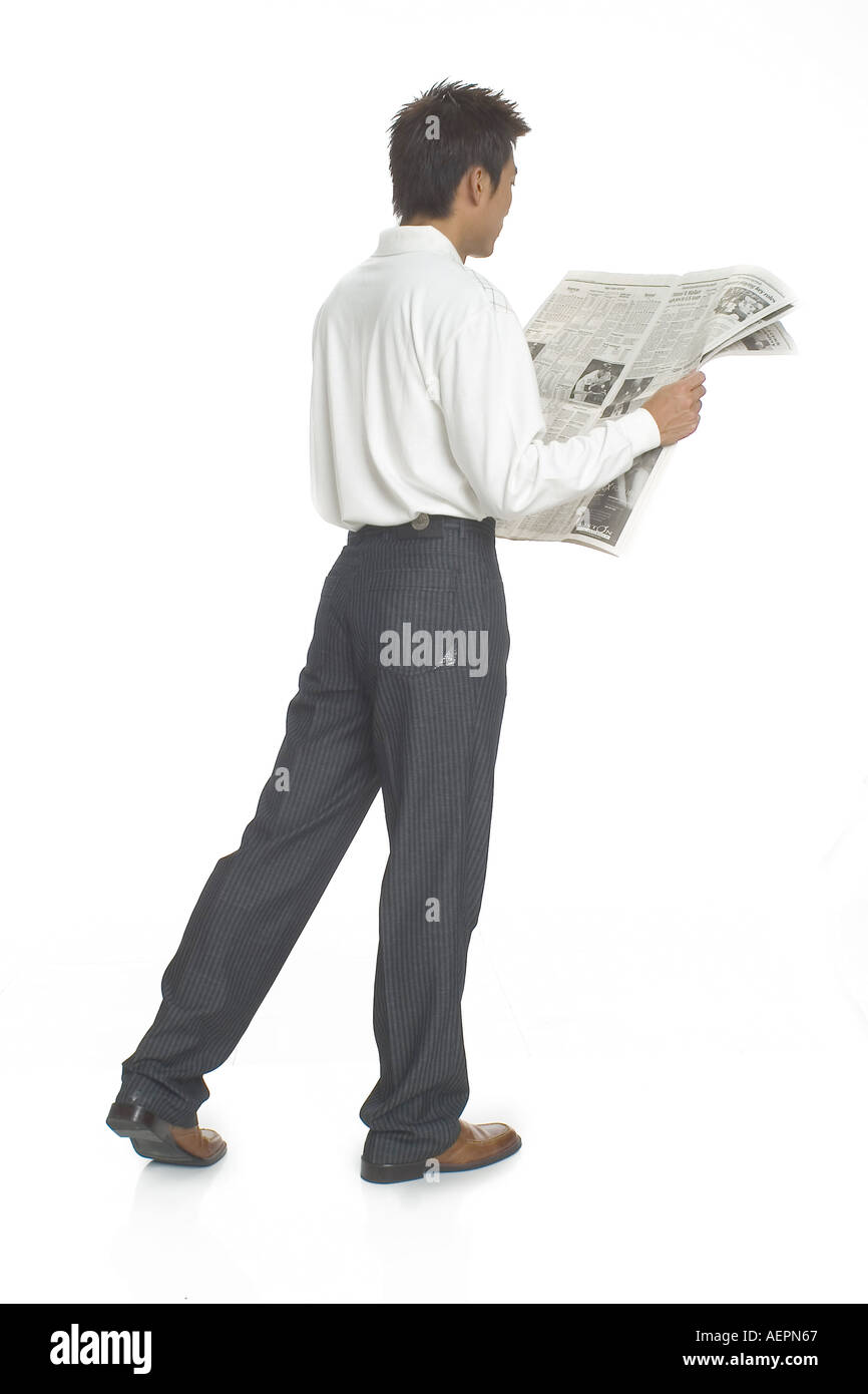 asian man with newspaper Stock Photo - Alamy