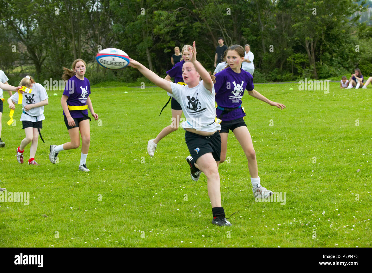 Girls playing rugby hi-res stock photography and images - Alamy