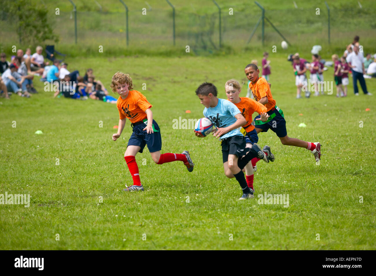 Boys playing rugby hi-res stock photography and images - Alamy