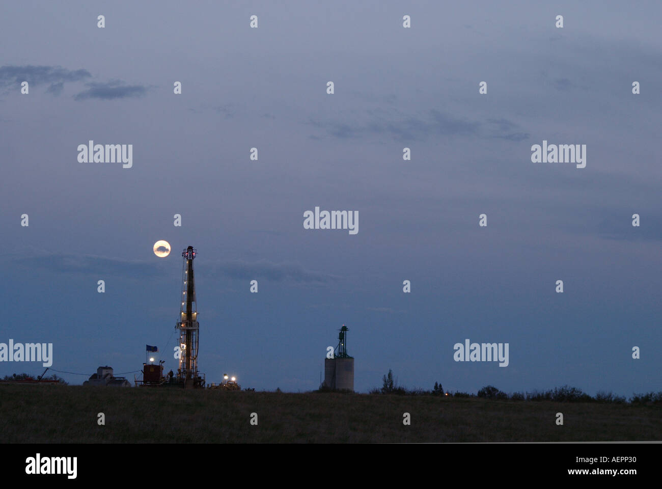 Drilling Rig in moonlight Stock Photo - Alamy