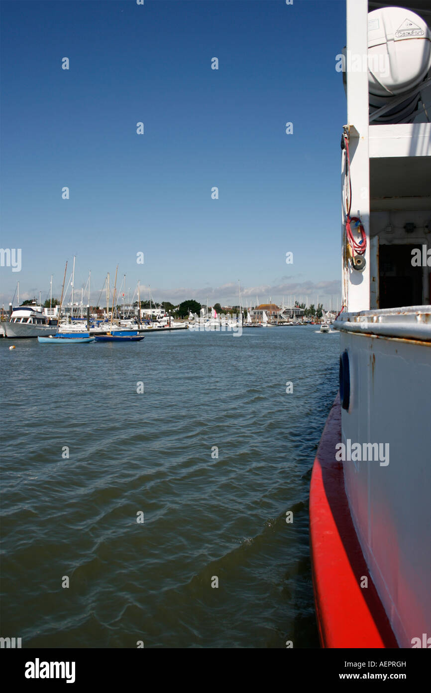 Lymington Harbour Awaits: an Isle of Wight ferry leaves harbour Stock Photo - Alamy