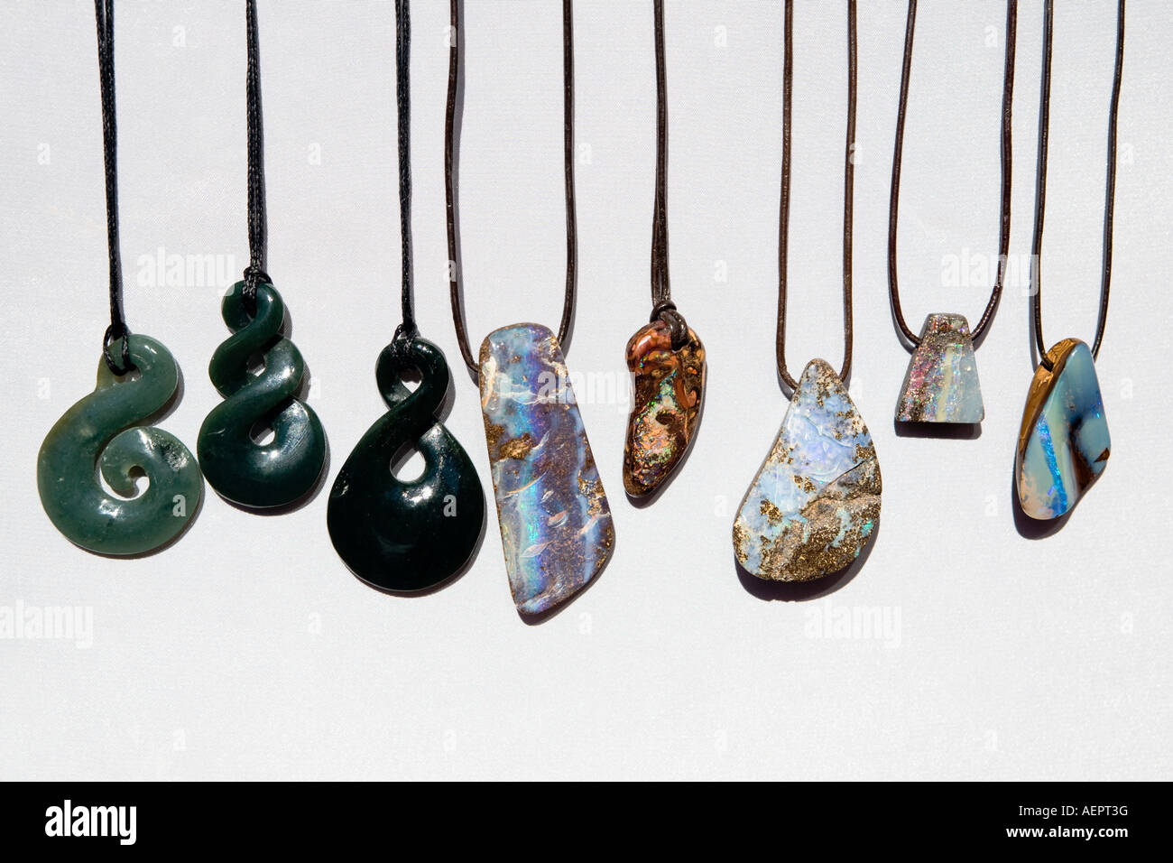 Opal and Jade hand crafted pendants Stock Photo - Alamy