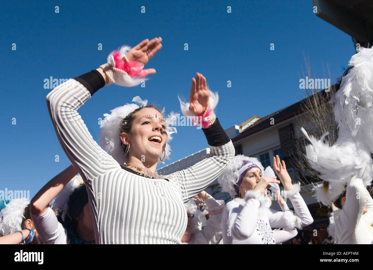 Procession of dancing women in white Stock Photo - Alamy