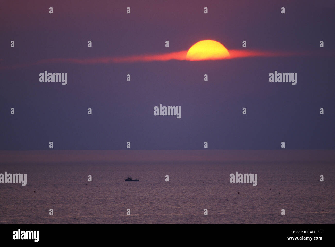 gillnet fishing boat drives past set net buoys in Cook Inlet ...