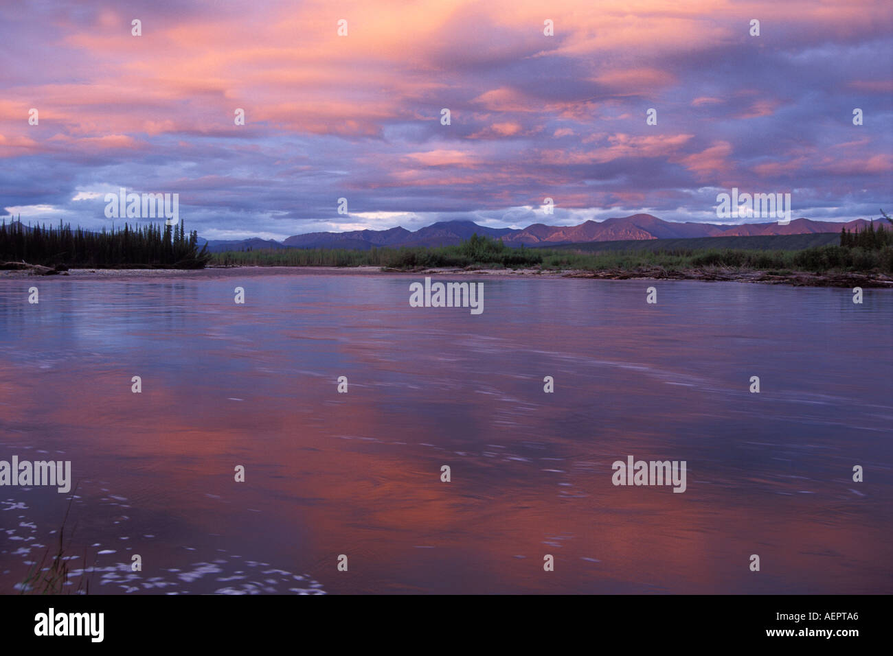 McKenzie River under the midnight sun Yukon Territory Stock Photo - Alamy