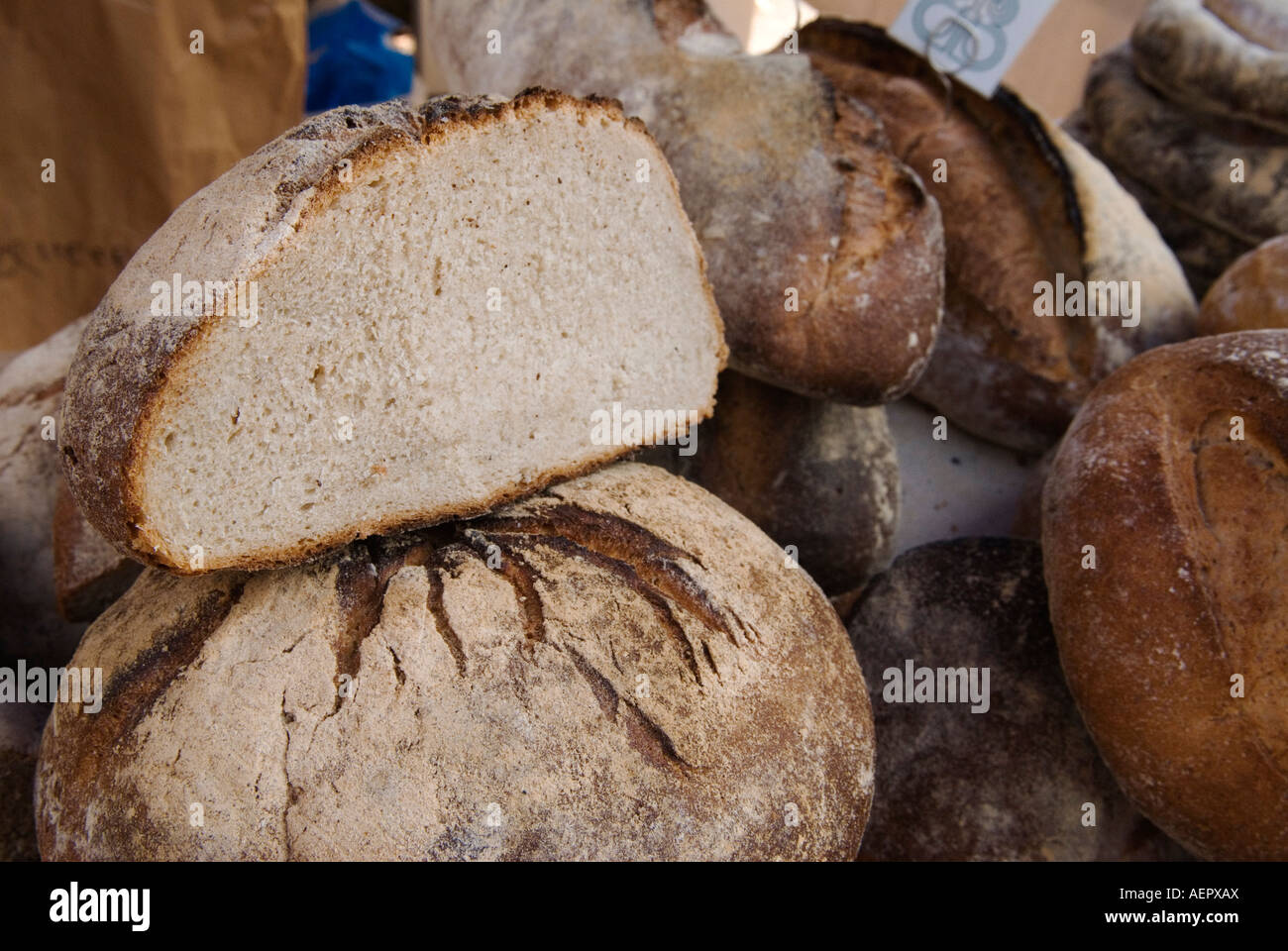 Loafs of brown bread speciality breads. Artisan bread loaves for a ...