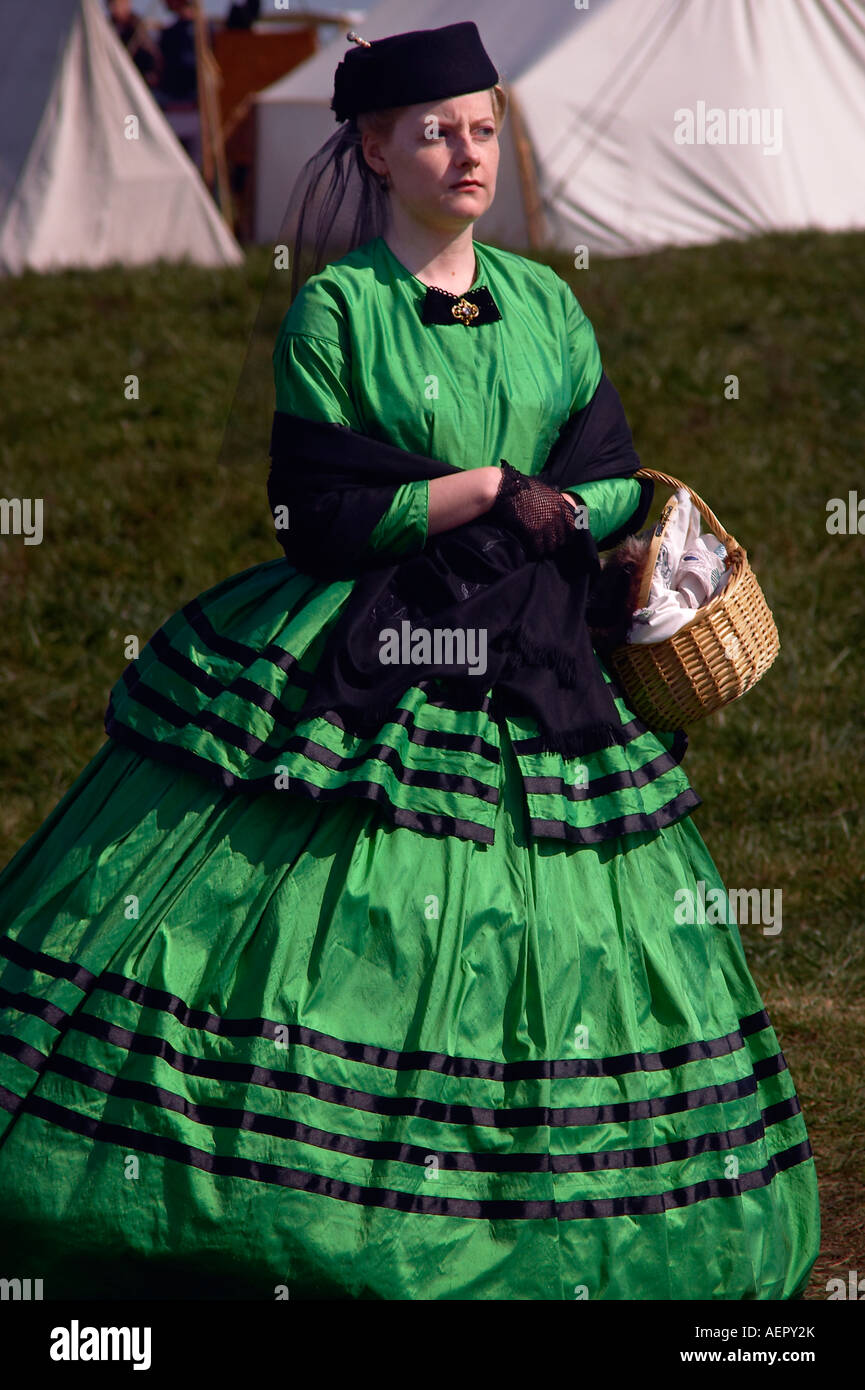 A reenactor portrays a female camp follower reenactment of the Battle ...