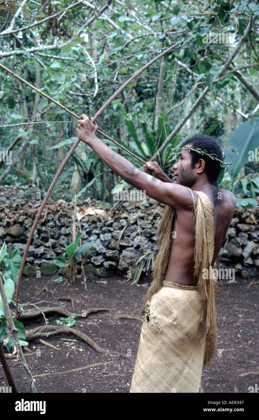 Young boy playing a traditional musical instrument, Ekasup Cultural ...