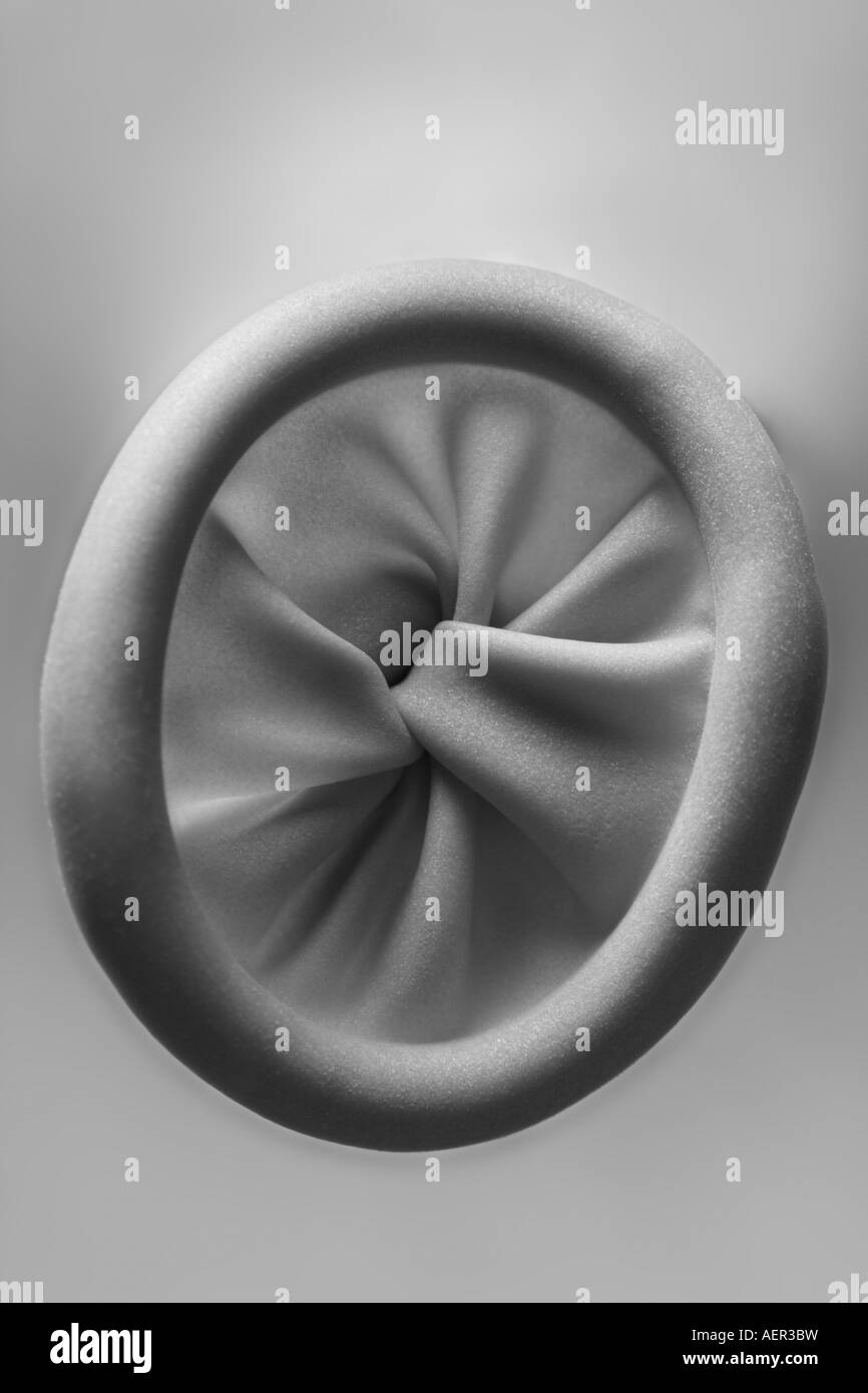 The knotted end of an inflated party balloon Stock Photo - Alamy