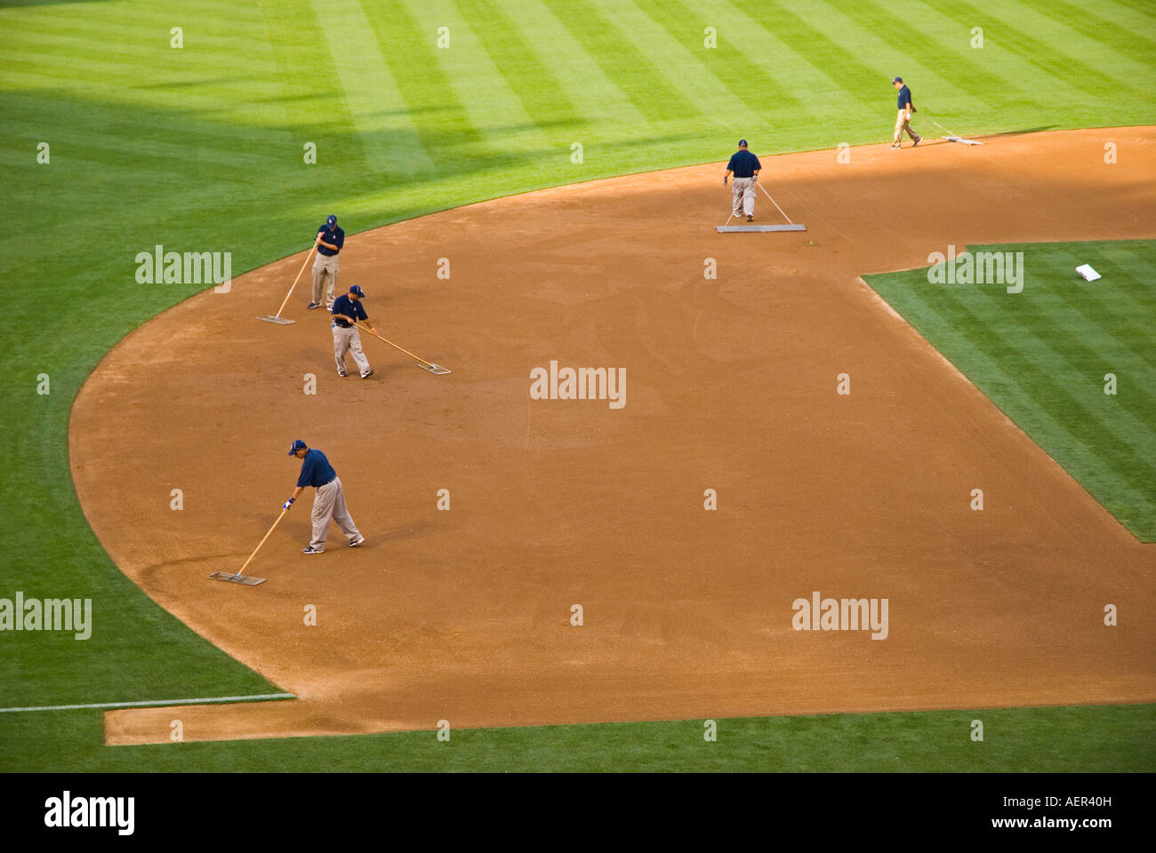 Crew preparing the baseball diamond before a game at Petco Park San ...