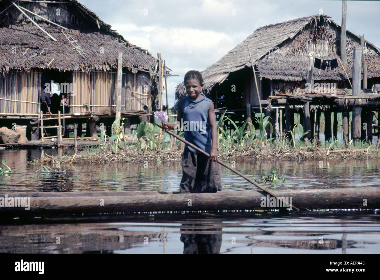 Girl in a canoe on the Sepik River in Papua New Guinea Stock Photo - Alamy